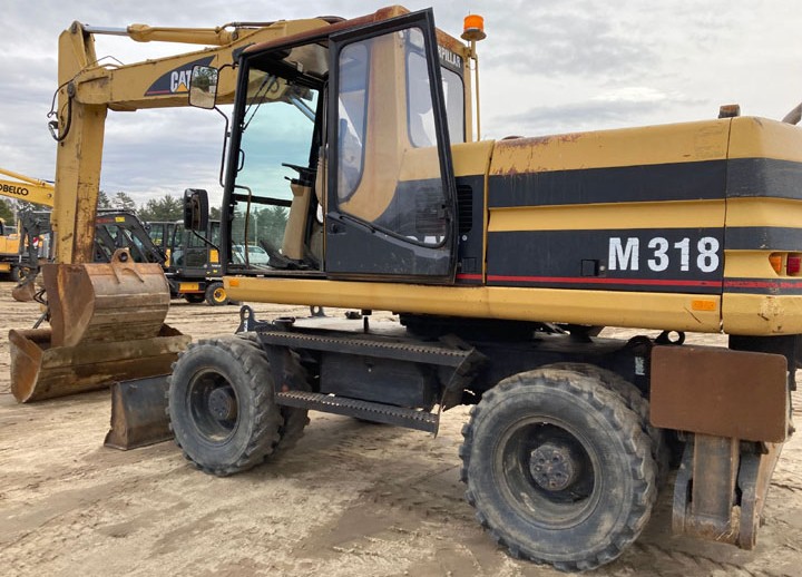2002 Caterpillar M318 For Sale in Houston, Texas, USA | MY-Equipment.com